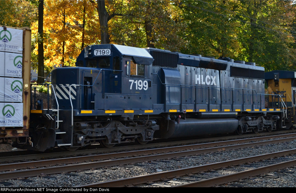 HLCX SD40-2 7199 trails on Q409-19